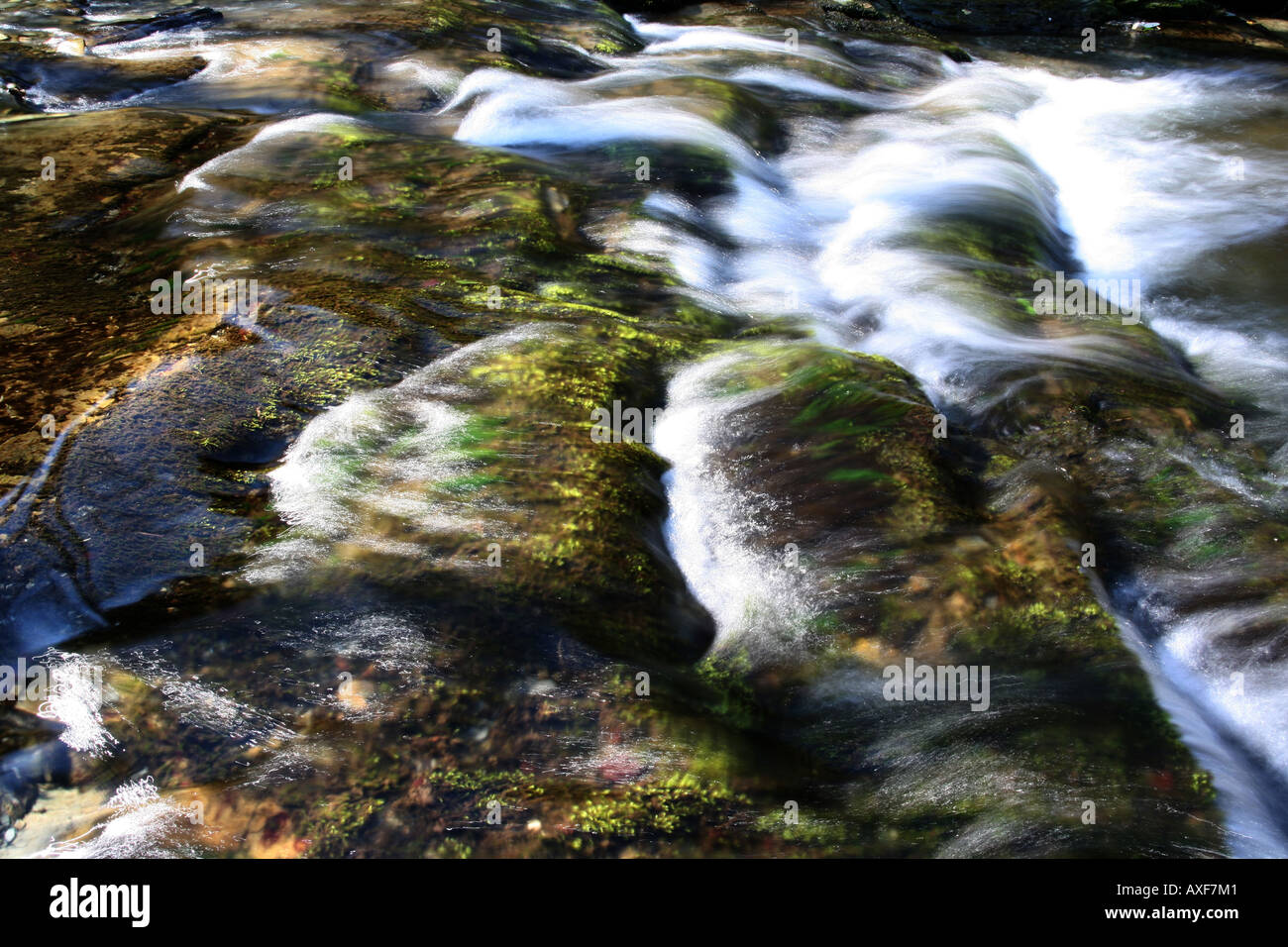 Brook flows down waterfall hi-res stock photography and images - Alamy