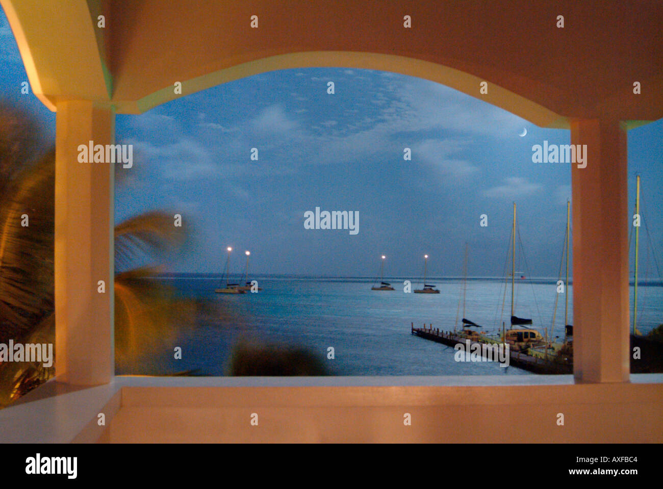 Moonlight on a Caribbean beach as seen from a hotel balcony Stock Photo ...