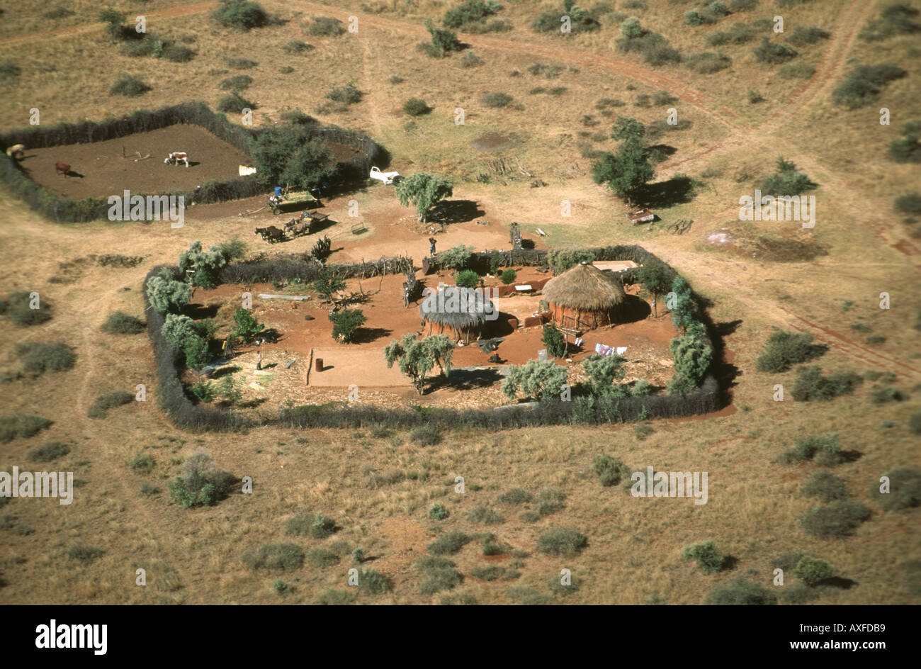 Aerial of a traditional hut compound and animal kraal in northern ...