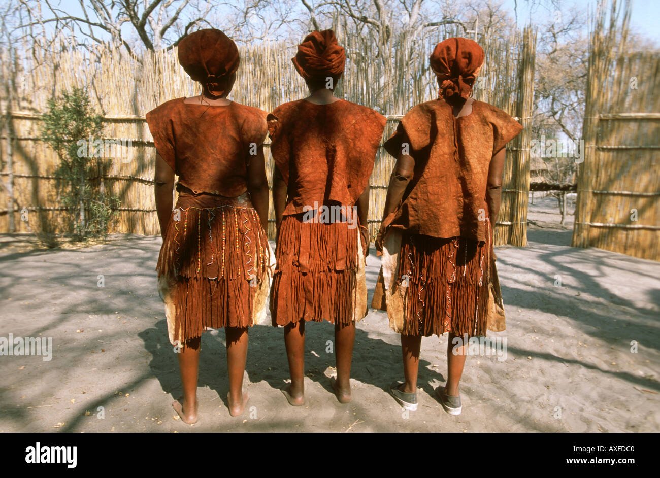 Tree ladies in traditioal leather dress Stock Photo - Alamy