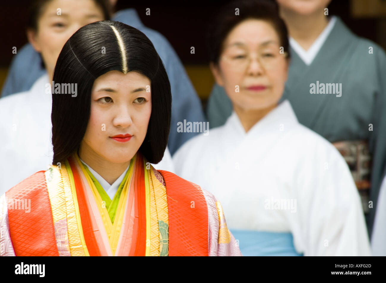 A woman dressed in Heian period costume at the Gokusui no en festival ...