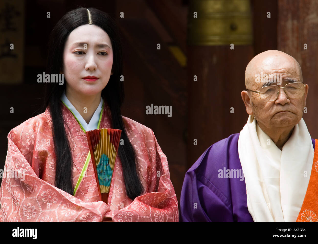 A man and a woman dressed in Heian period costume at the Gokusui no en ...
