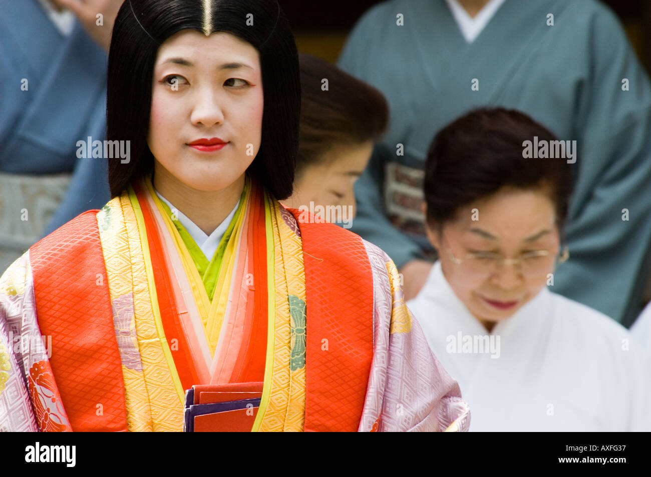 A woman dressed in Heian period costume at the Gokusui no en festival ...