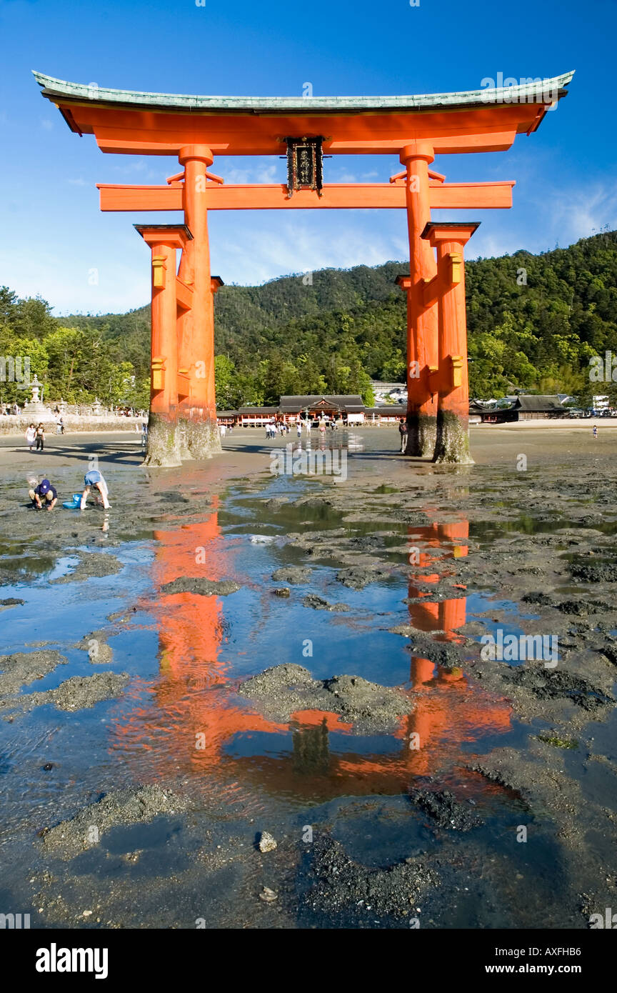 The floating torii gate of Miyajima stands in the bay near the ...