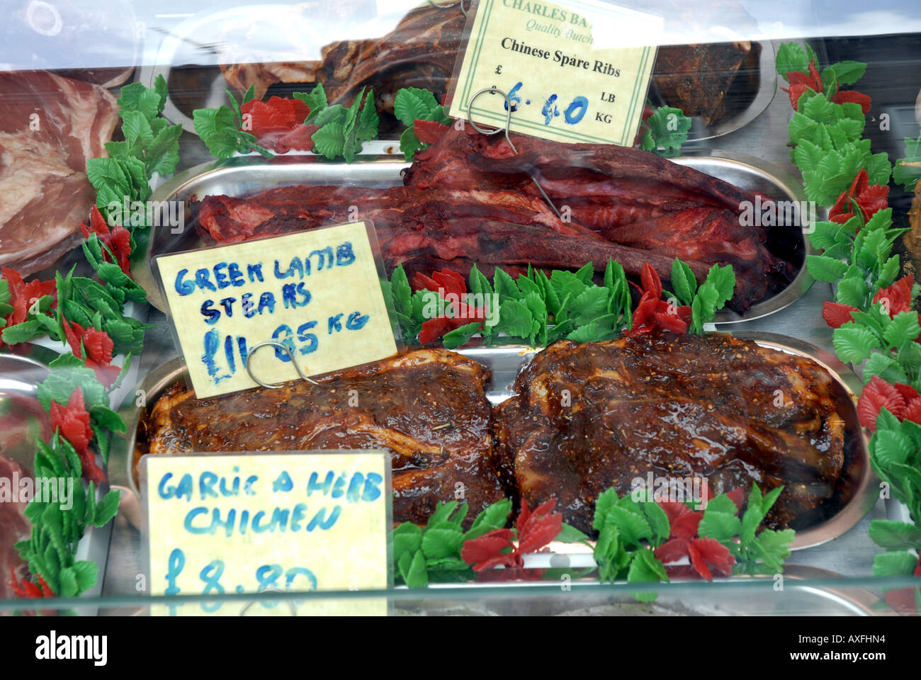 Butchers shop window display in Winchester Hampshire Stock Photo - Alamy