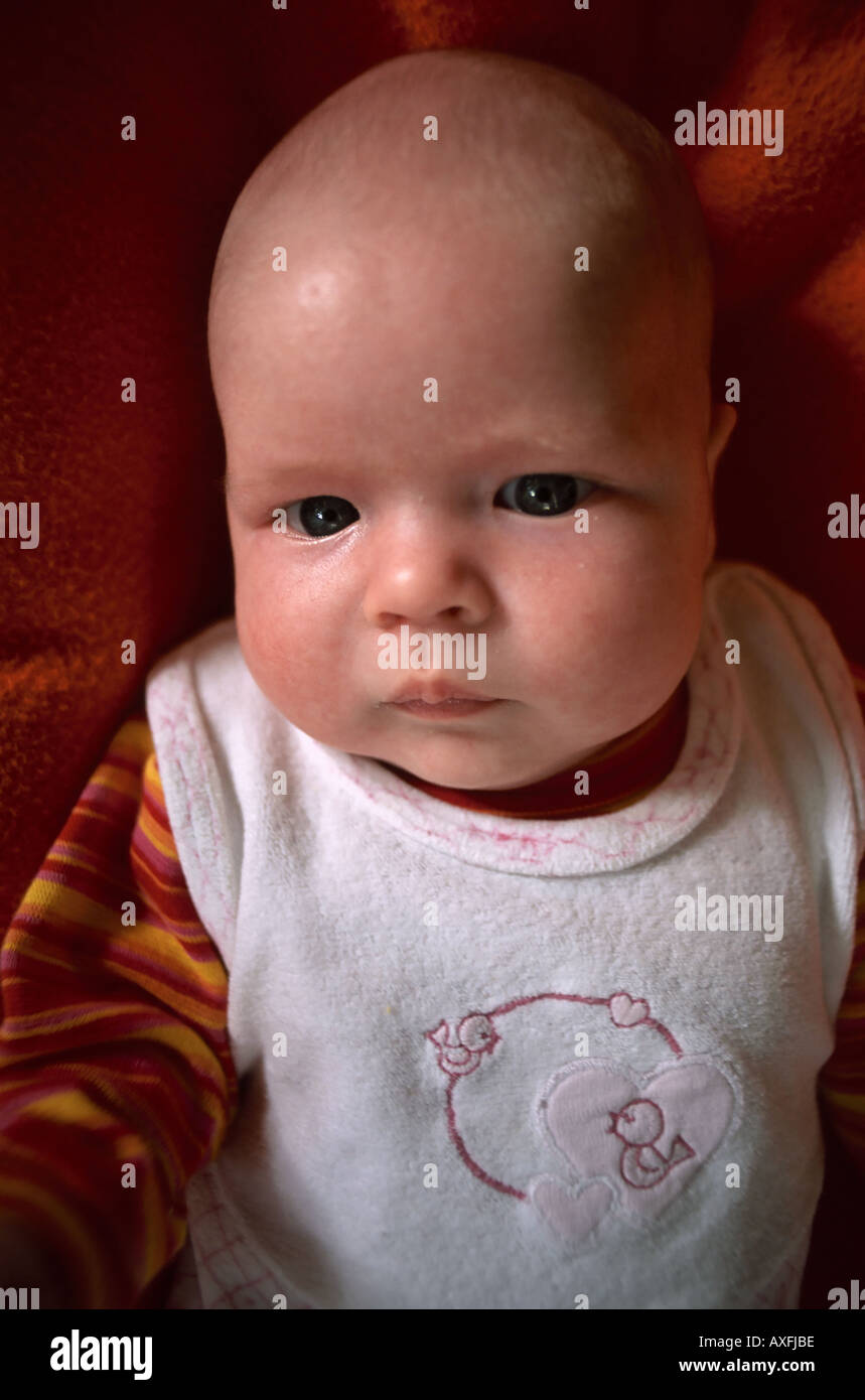 indoor flat child baby 0 5 lie cot bed portrait close up vertical Stock ...