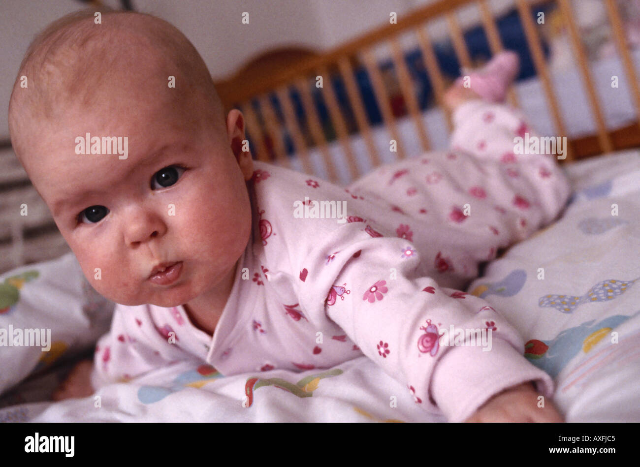 indoor flat child baby 0 5 lie cot bed grimace portrait horizontal ...