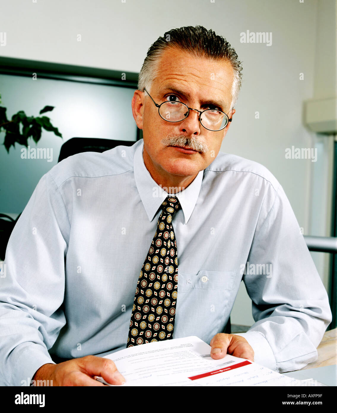 indoors office man mature 50 55 mustache glasses businessman business ...