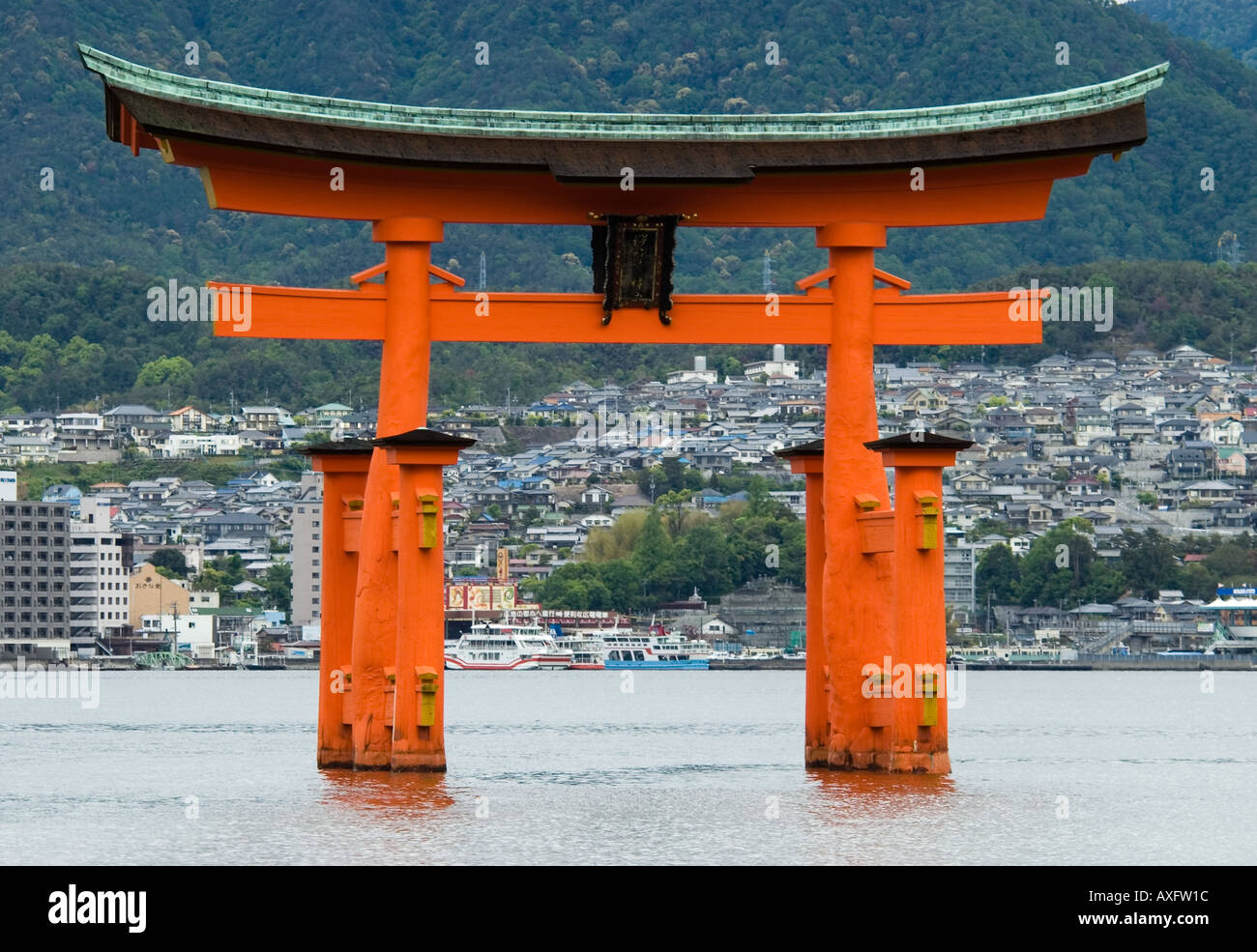 The floating torii gate of Miyajima stands in the bay near the ...