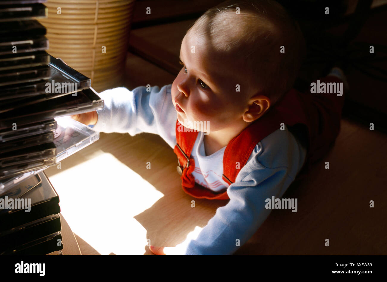 Baby play cd hi-res stock photography and images - Alamy