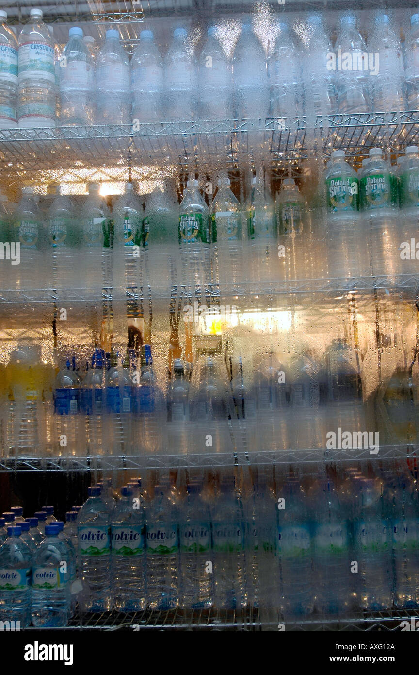 Display of bottles of water in a supermarket window Stock Photo - Alamy