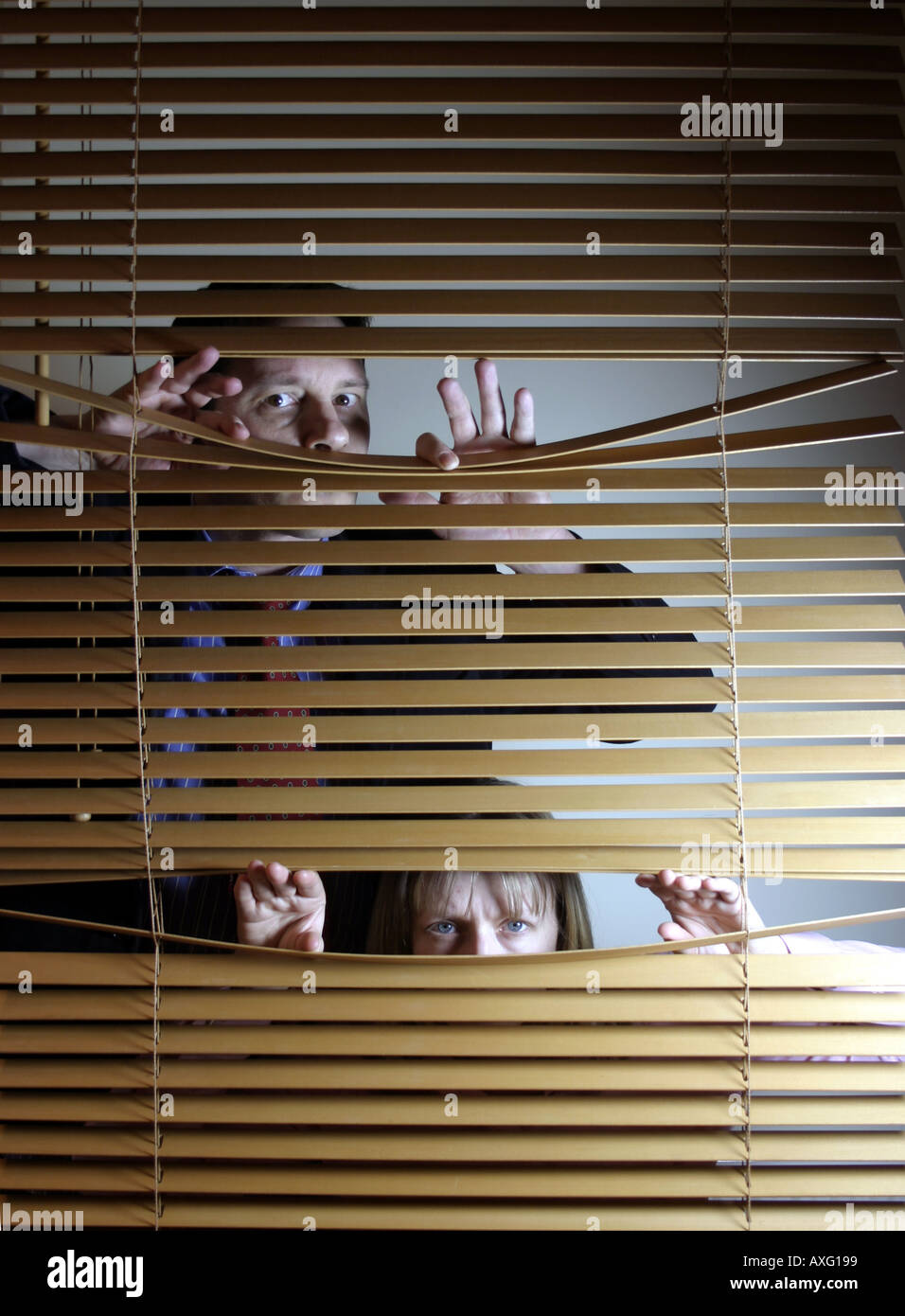 Man hiding behind curtains hi-res stock photography and images - Alamy
