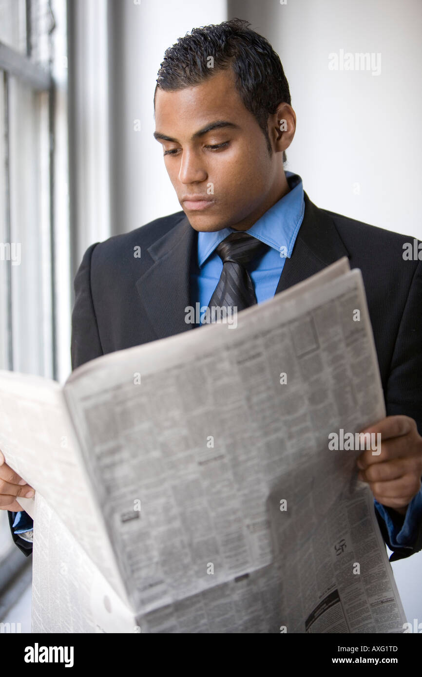 African men reading newspapers hi-res stock photography and images - Alamy