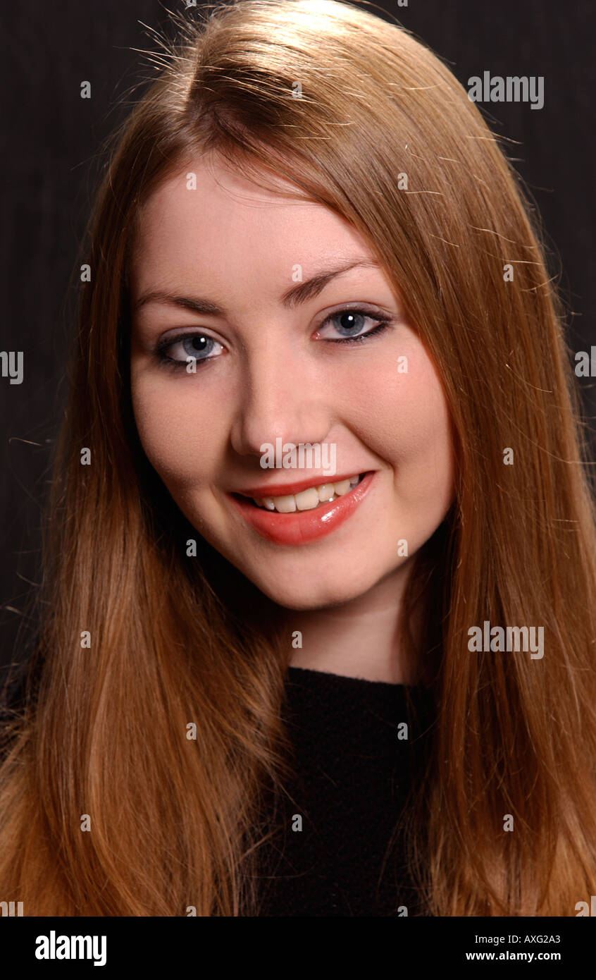 portrait of teenage girl smiling into camera Stock Photo - Alamy