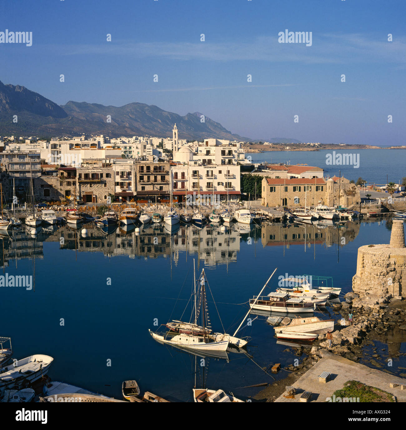A still early morning view of the harbour and waterfront of Kyrenia ...