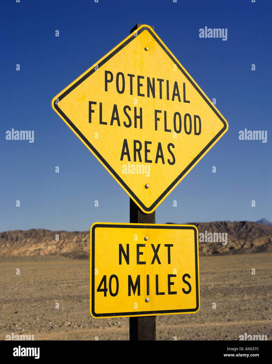 Yellow and black sign saying potential Flash Flood Areas Next 40 Miles ...