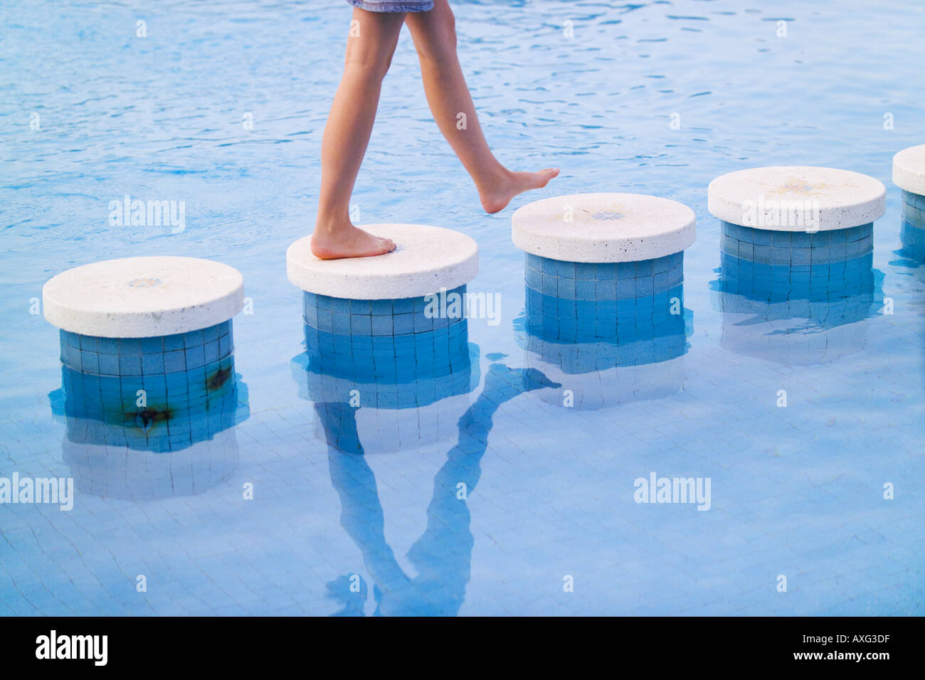 Child stepping stones hi-res stock photography and images - Alamy