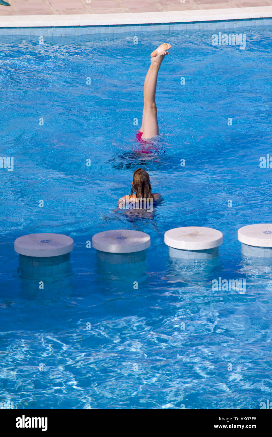 Woman Doing Handstand Under Water High Resolution Stock Photography and ...
