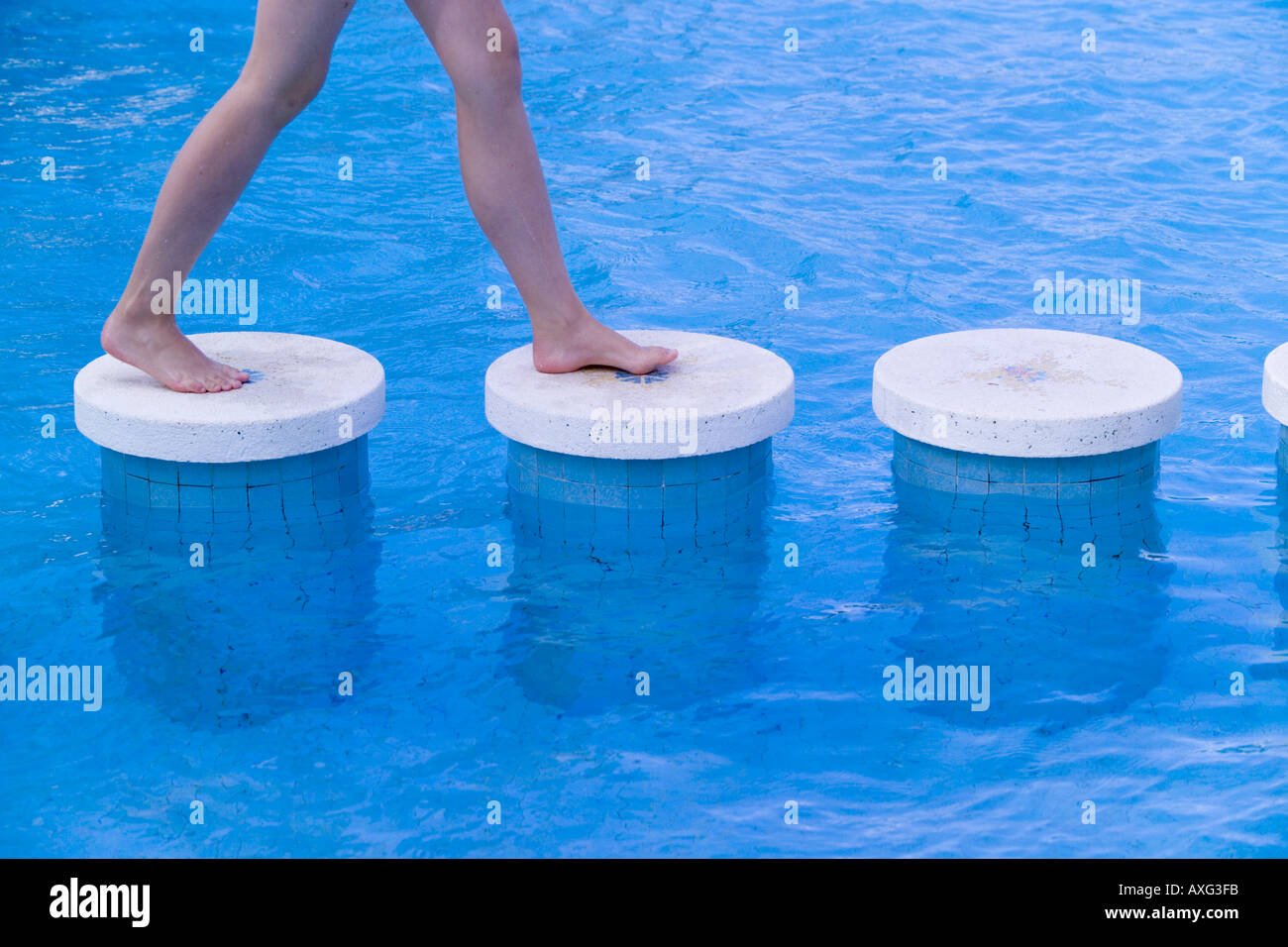 Child leaping water hi-res stock photography and images - Alamy