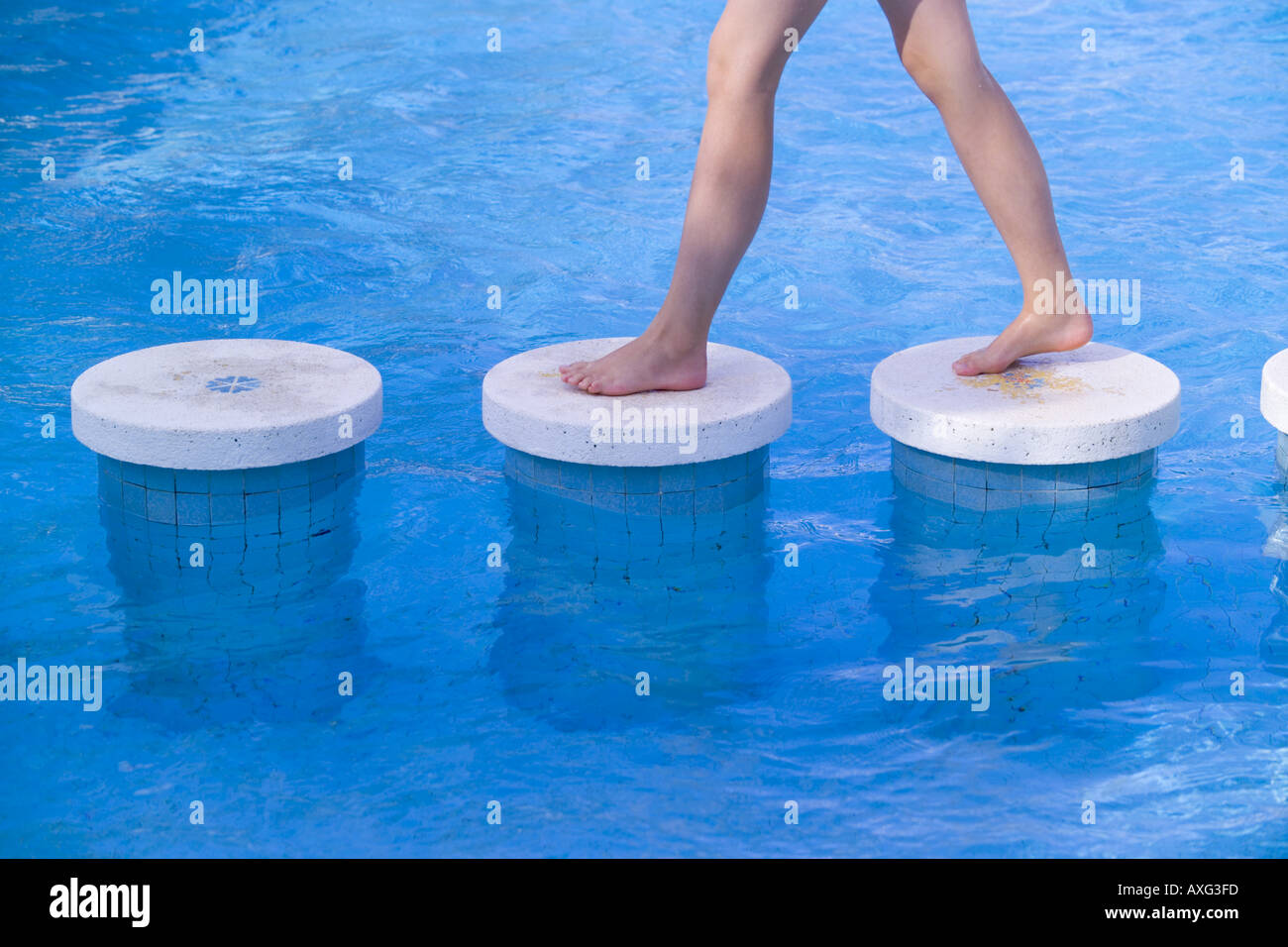 Child stepping stones hi-res stock photography and images - Alamy