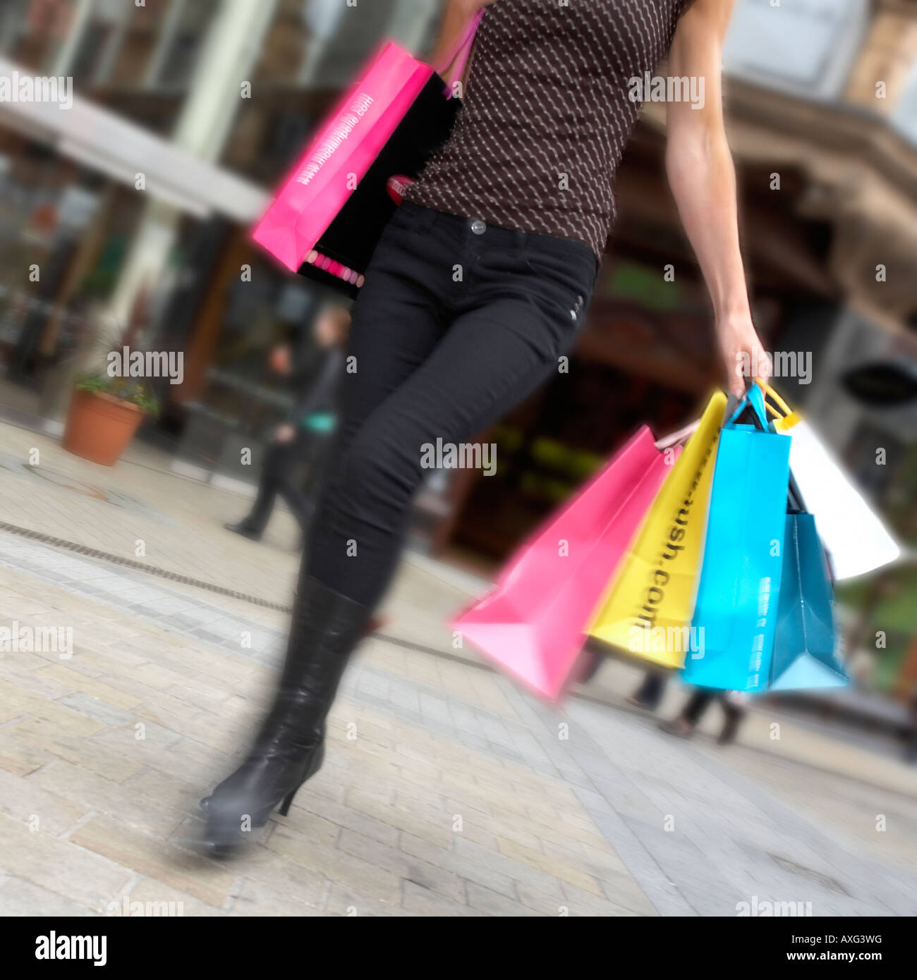 Woman spending lots of money hi-res stock photography and images - Alamy