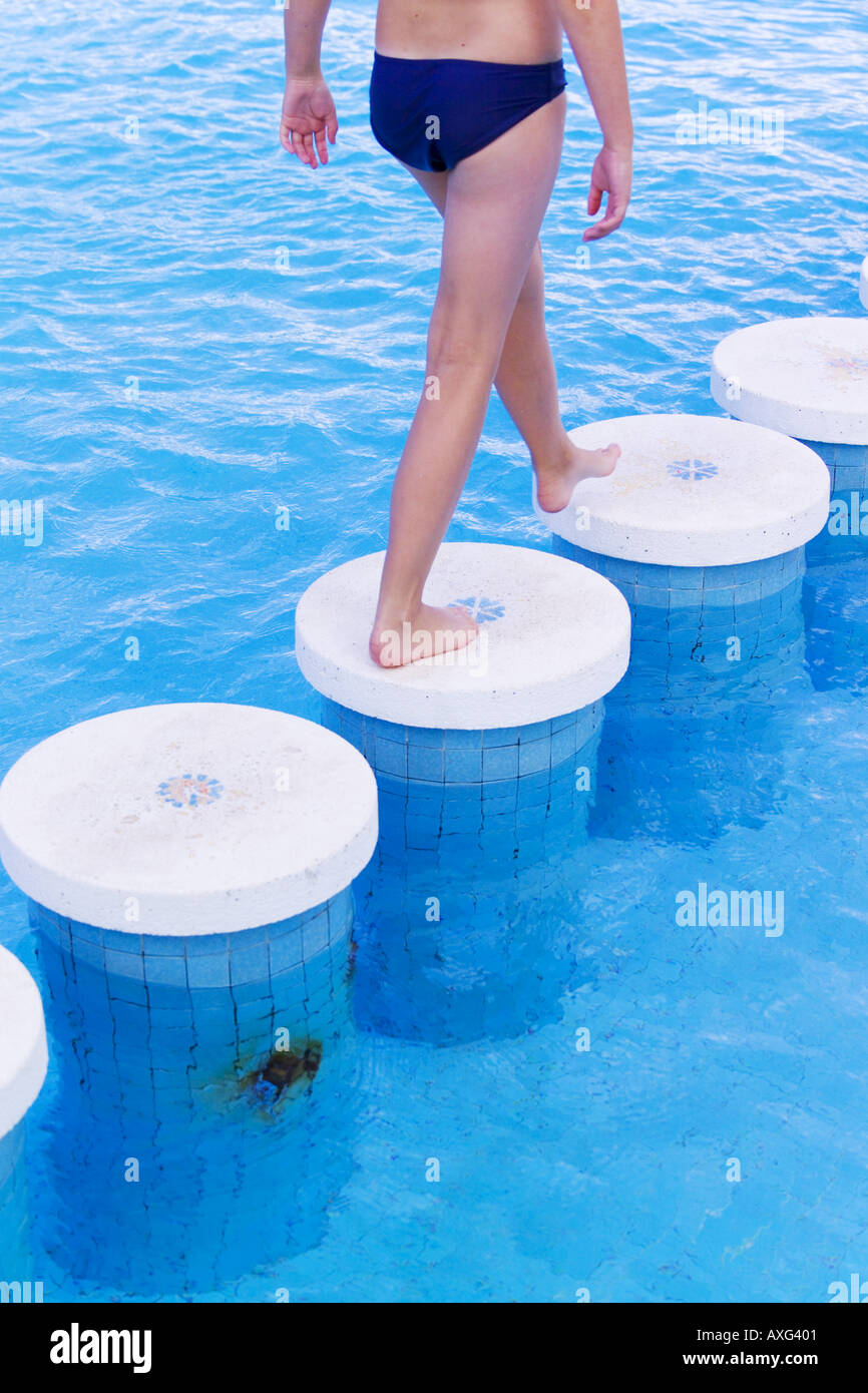 Child stepping stones hi-res stock photography and images - Alamy