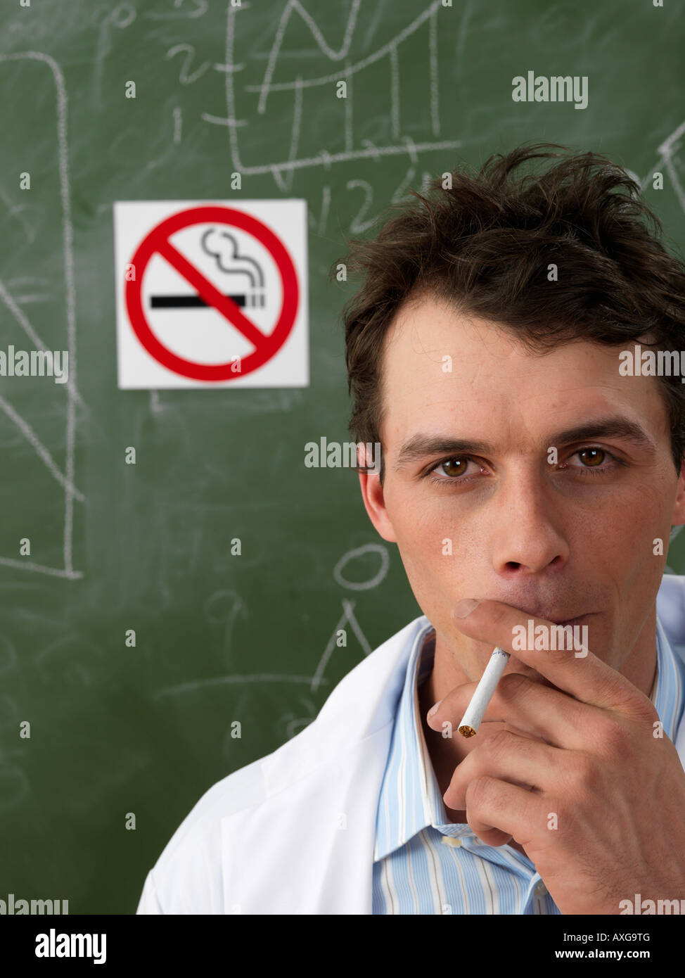 Scientist Smoking near No Smoking Sign Stock Photo - Alamy
