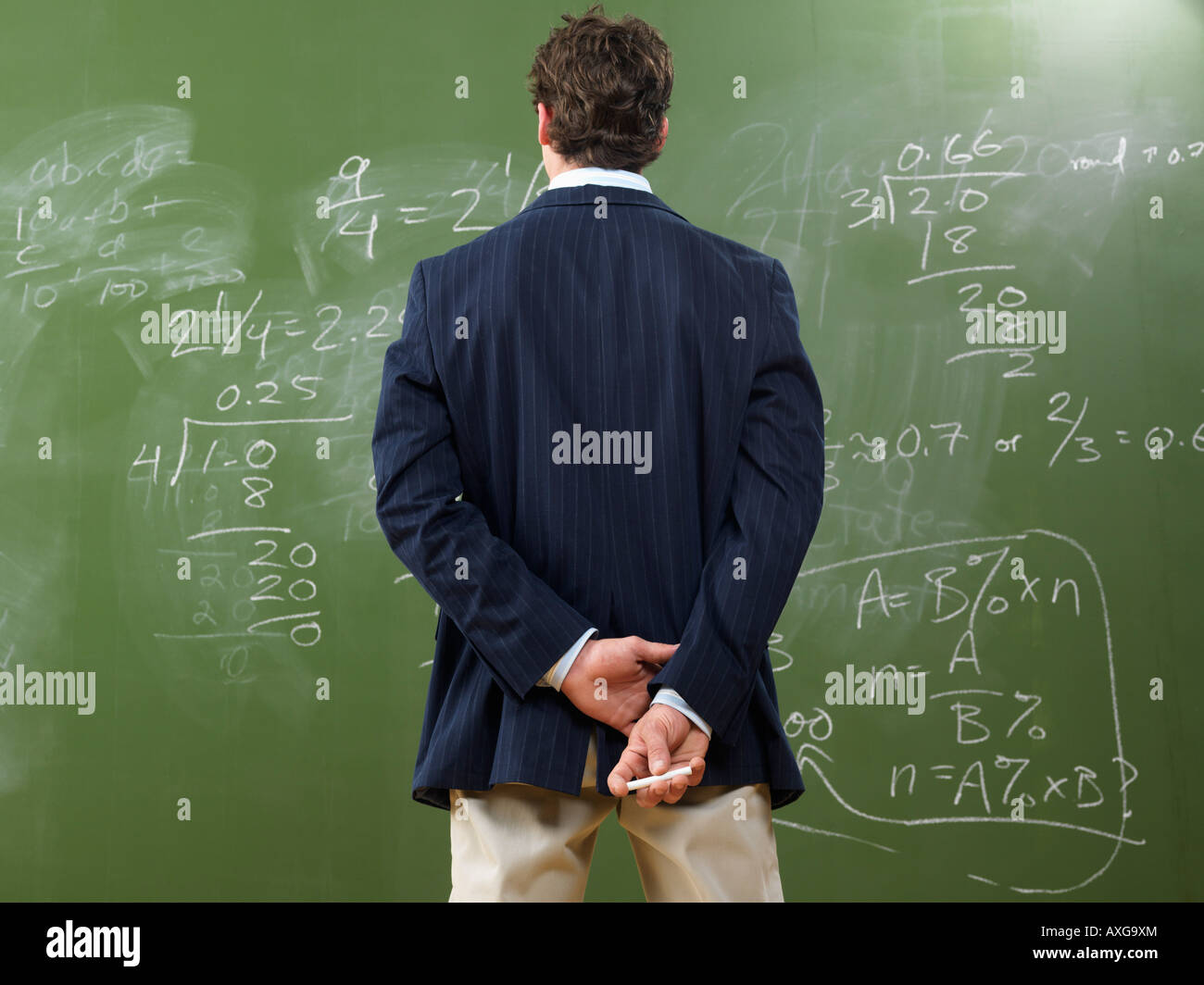 Backview male teacher and blackboard hi-res stock photography and ...