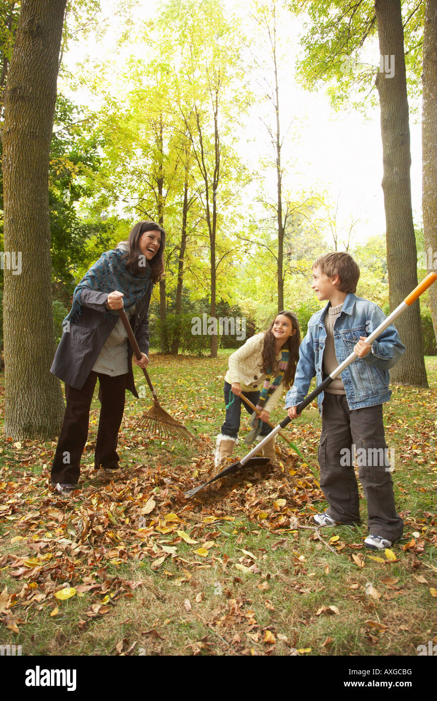 Child raking leaves hispanic hi-res stock photography and images - Alamy