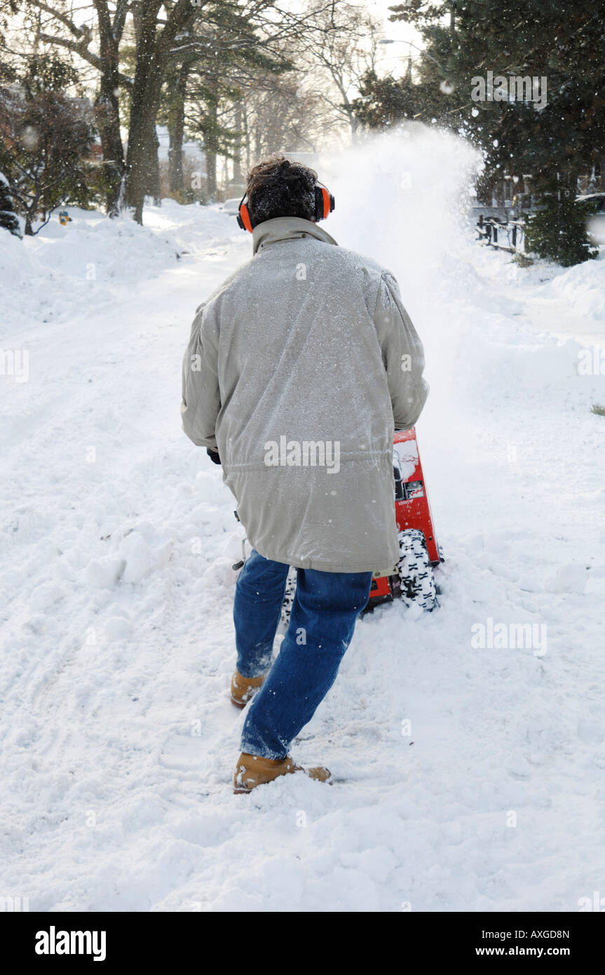 Man Using Snowblower Stock Photo - Alamy