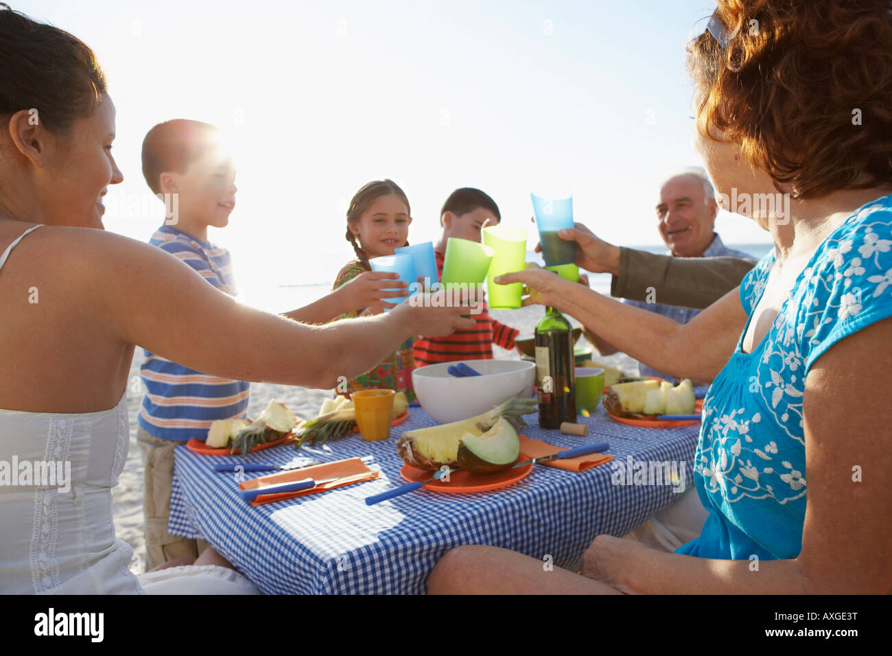 Hispanic grandfather and adult eating hi-res stock photography and images - Alamy