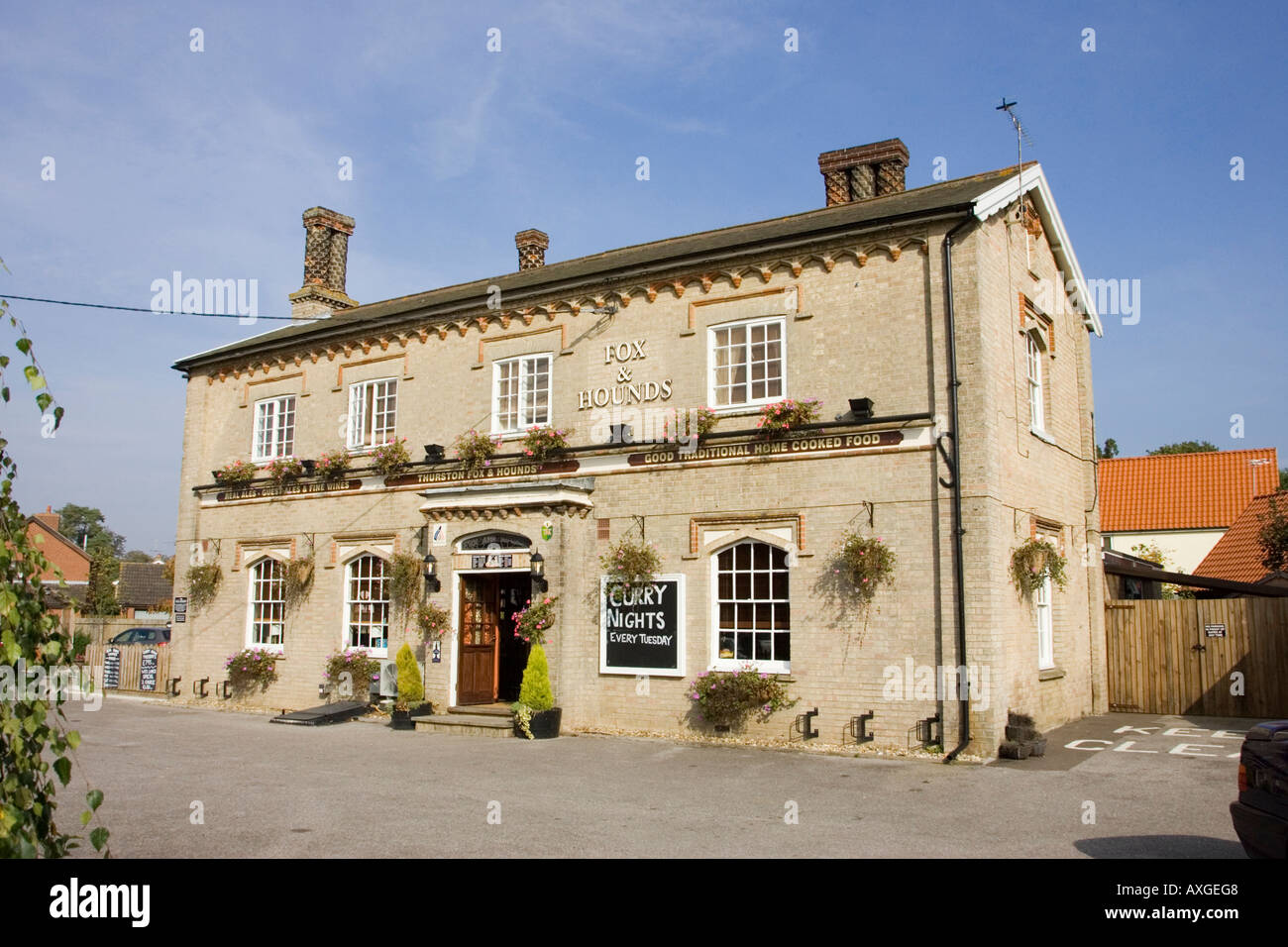 Fox & Hounds Pub in the village of Thurston in Suffolk, UK Stock Photo ...