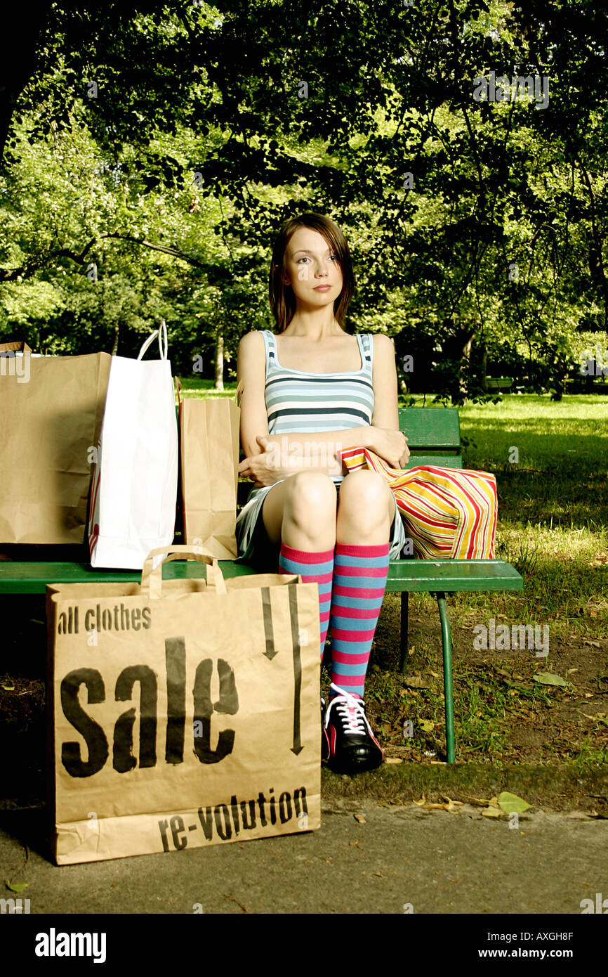 outdoor summer spring park bench woman girl young 20 25 brunette sit ...
