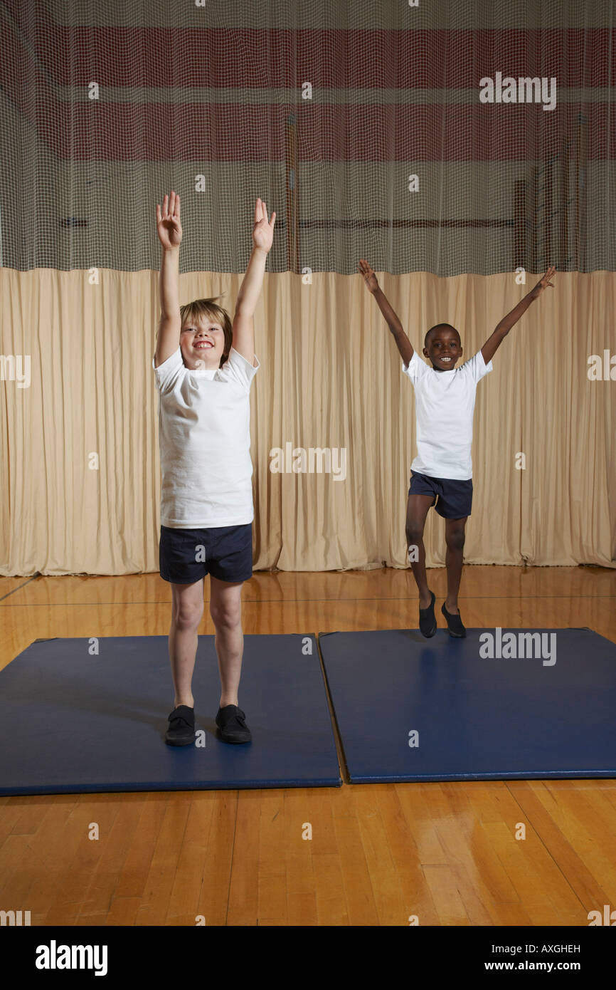 Kids stretching at school gym hi-res stock photography and images - Alamy