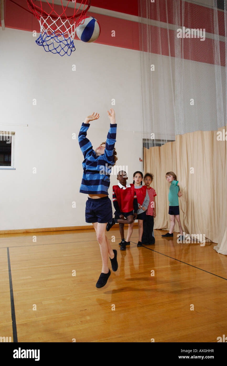 Children playing basketball indoor hi-res stock photography and images ...