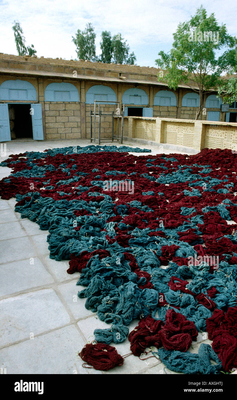 India Rajasthan crafts Barmer bundles of bundhini tie dyed cloth drying ...
