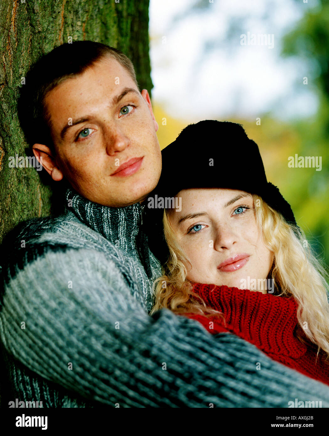 outdoor day autumn tree trees close up woman girl man boy 20 25 blonde ...