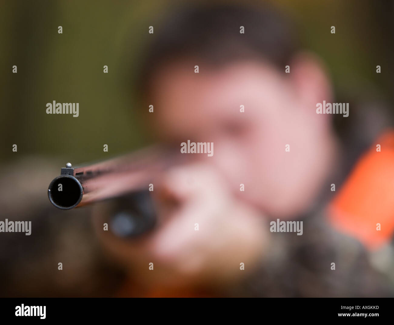 Hunter aiming his rifle Stock Photo - Alamy