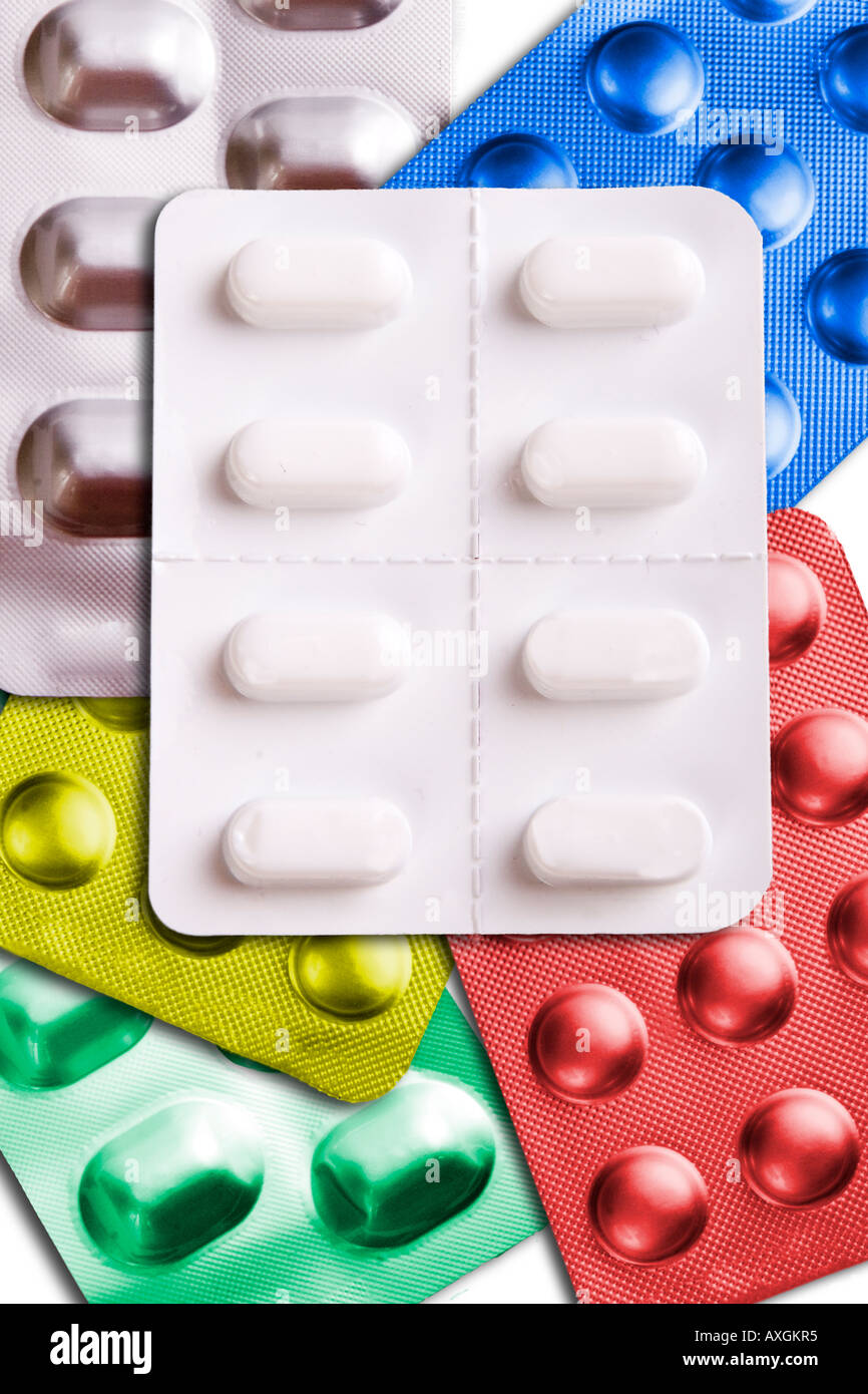 Tablet sachets of different colours Stock Photo - Alamy