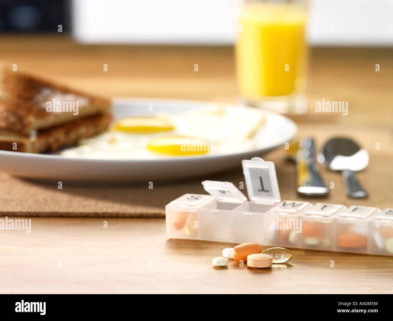 Still Life of Pills and Breakfast Stock Photo - Alamy