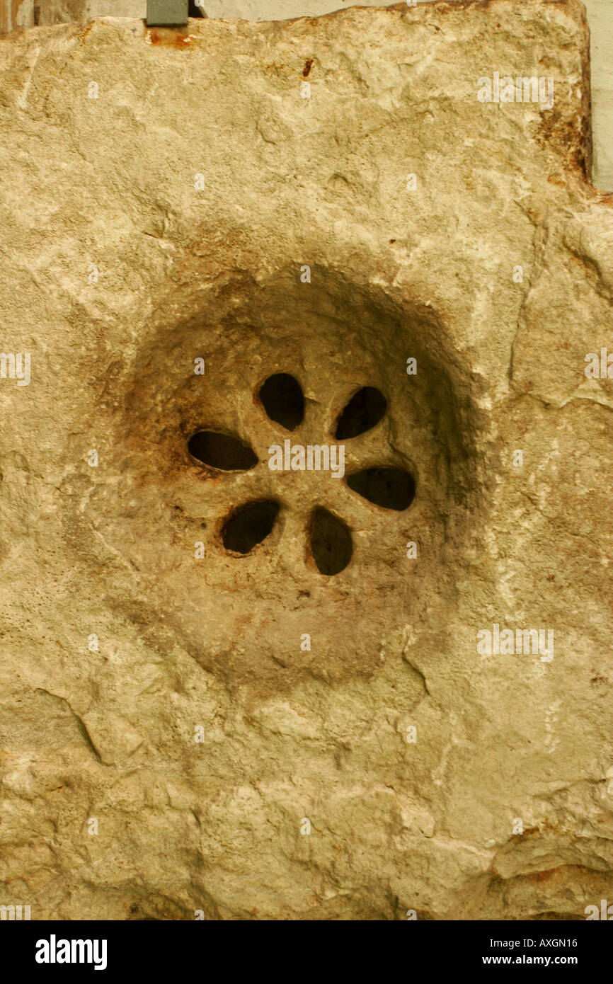 Roman drain cover in the road at the ruined Roman town of Aquincum near ...