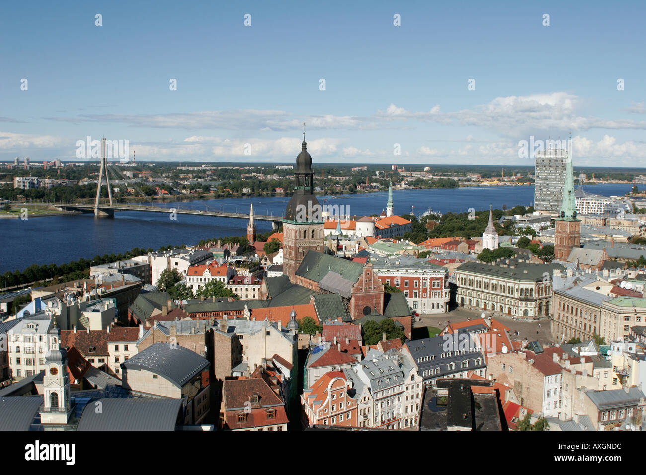 View of the suspension bridge and St Peter s church in Riga Latvia ...