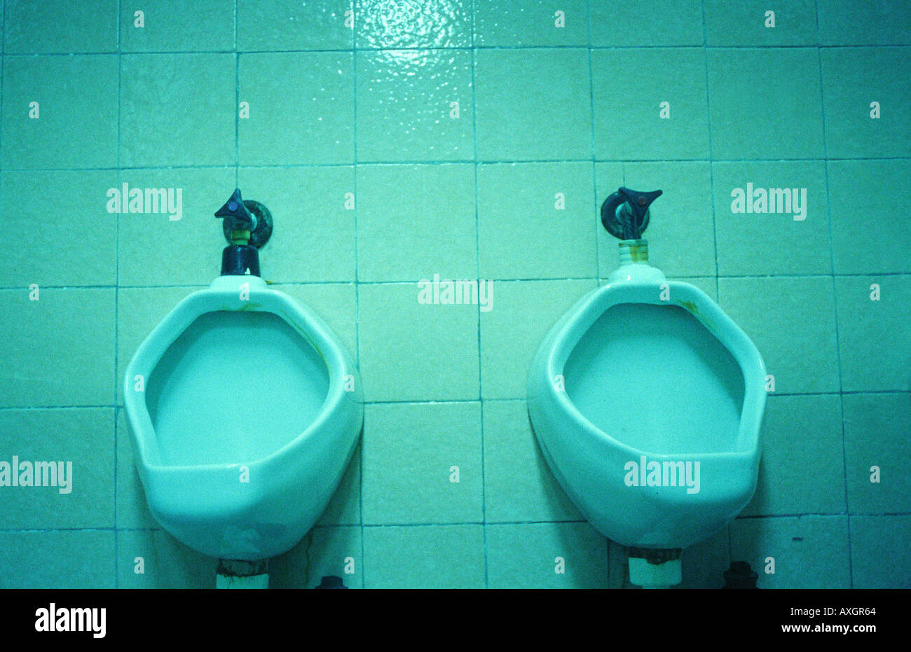 Two urinals in the restroom Stock Photo - Alamy