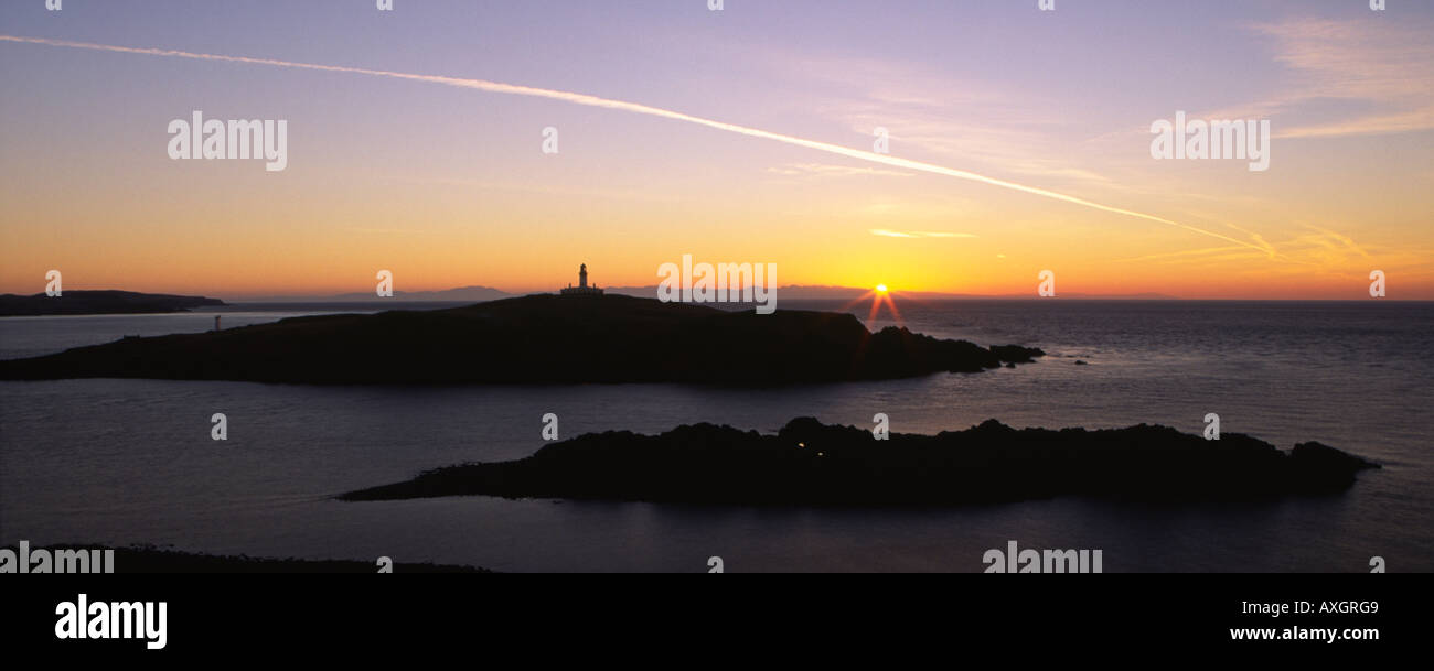 Little Ross lighthouse silhouetted against sunrise Stock Photo - Alamy