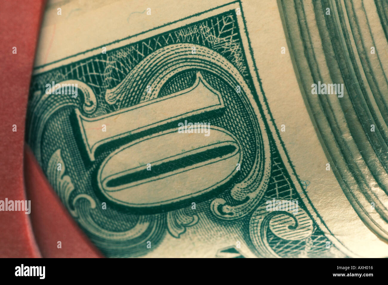 rubber band on roll of 10 dollar bills USA Stock Photo - Alamy