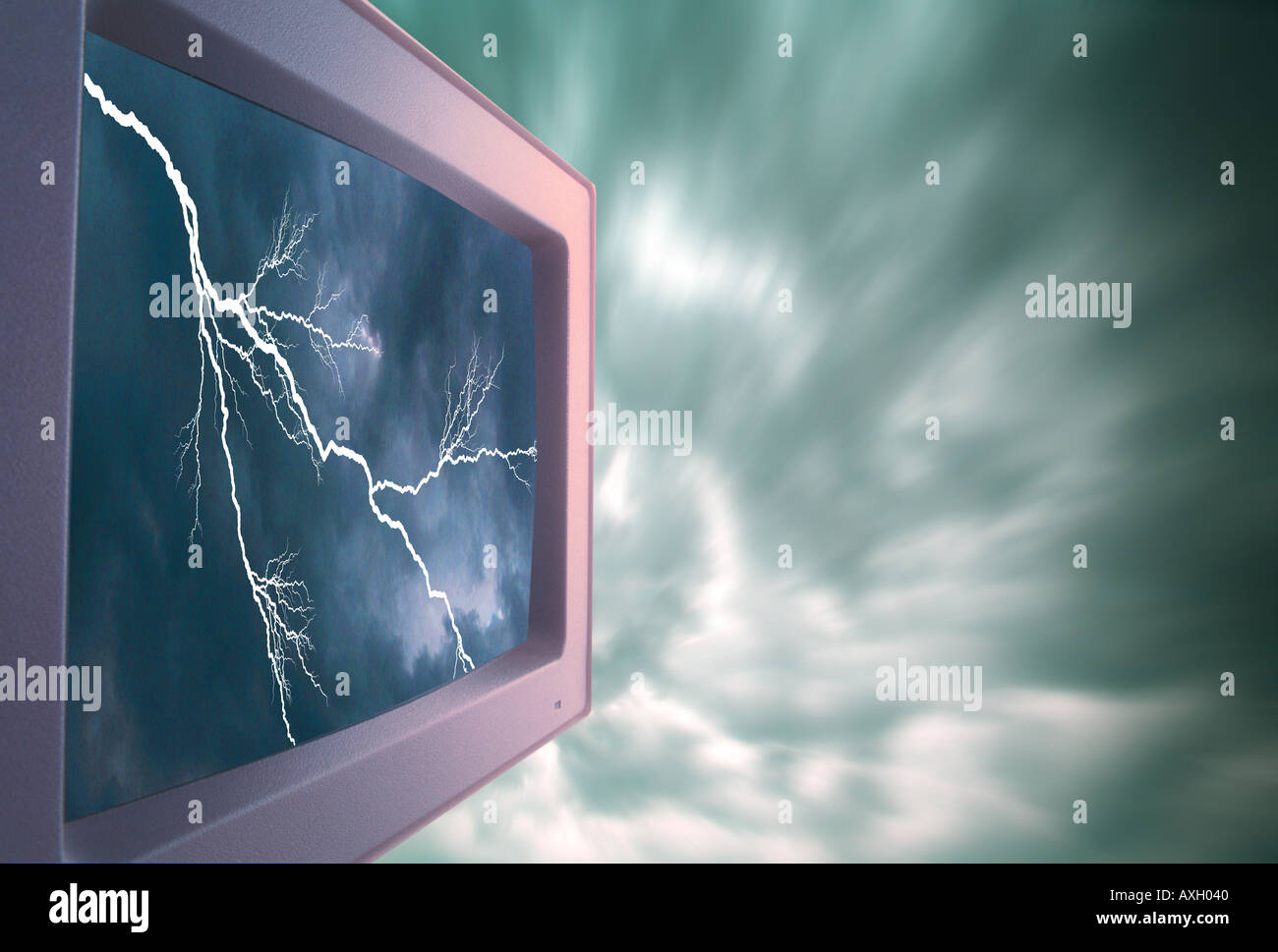 computer monitor with storm clouds and lightning image on screen and ...