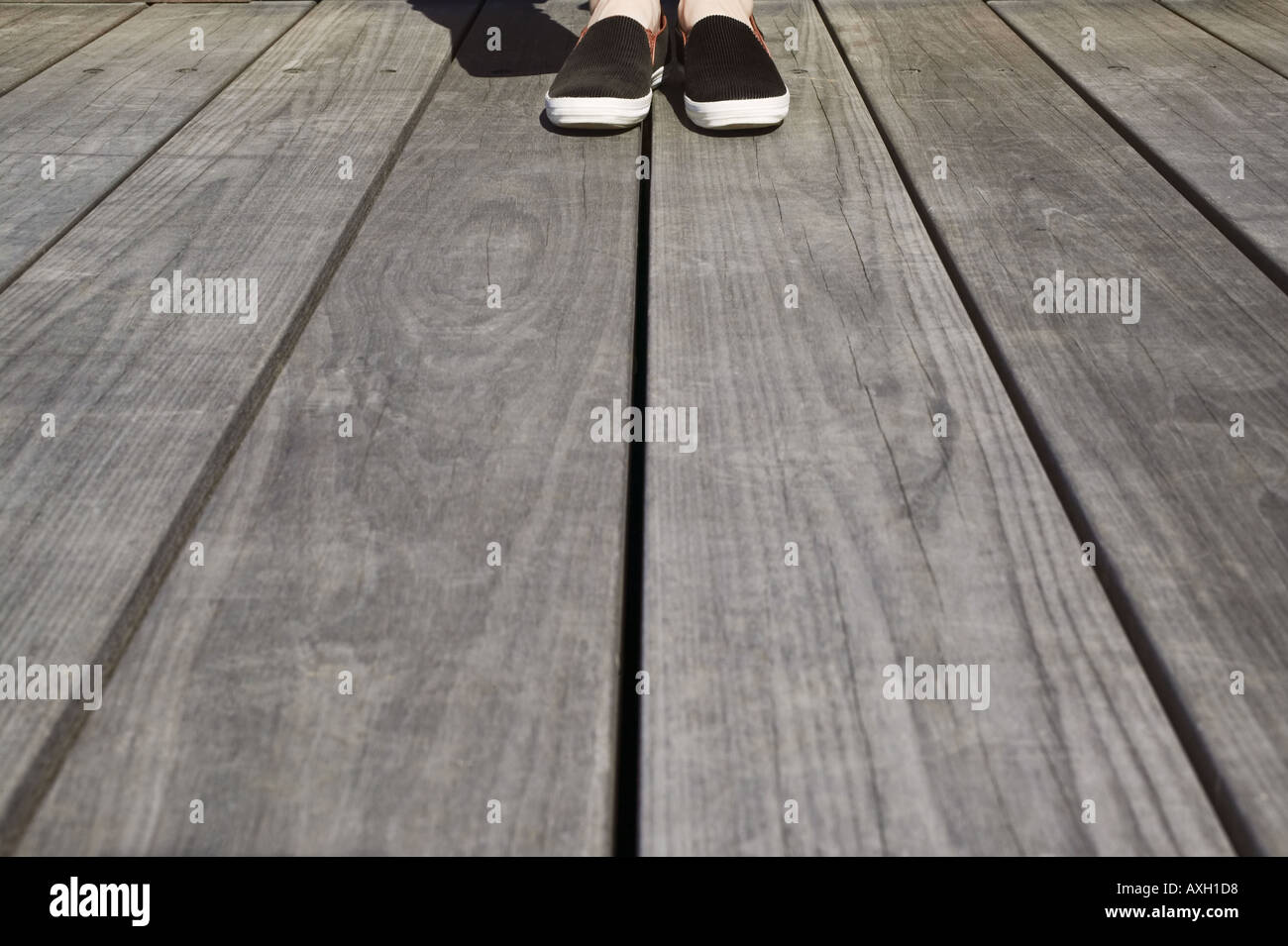 Feet on pier hi-res stock photography and images - Alamy