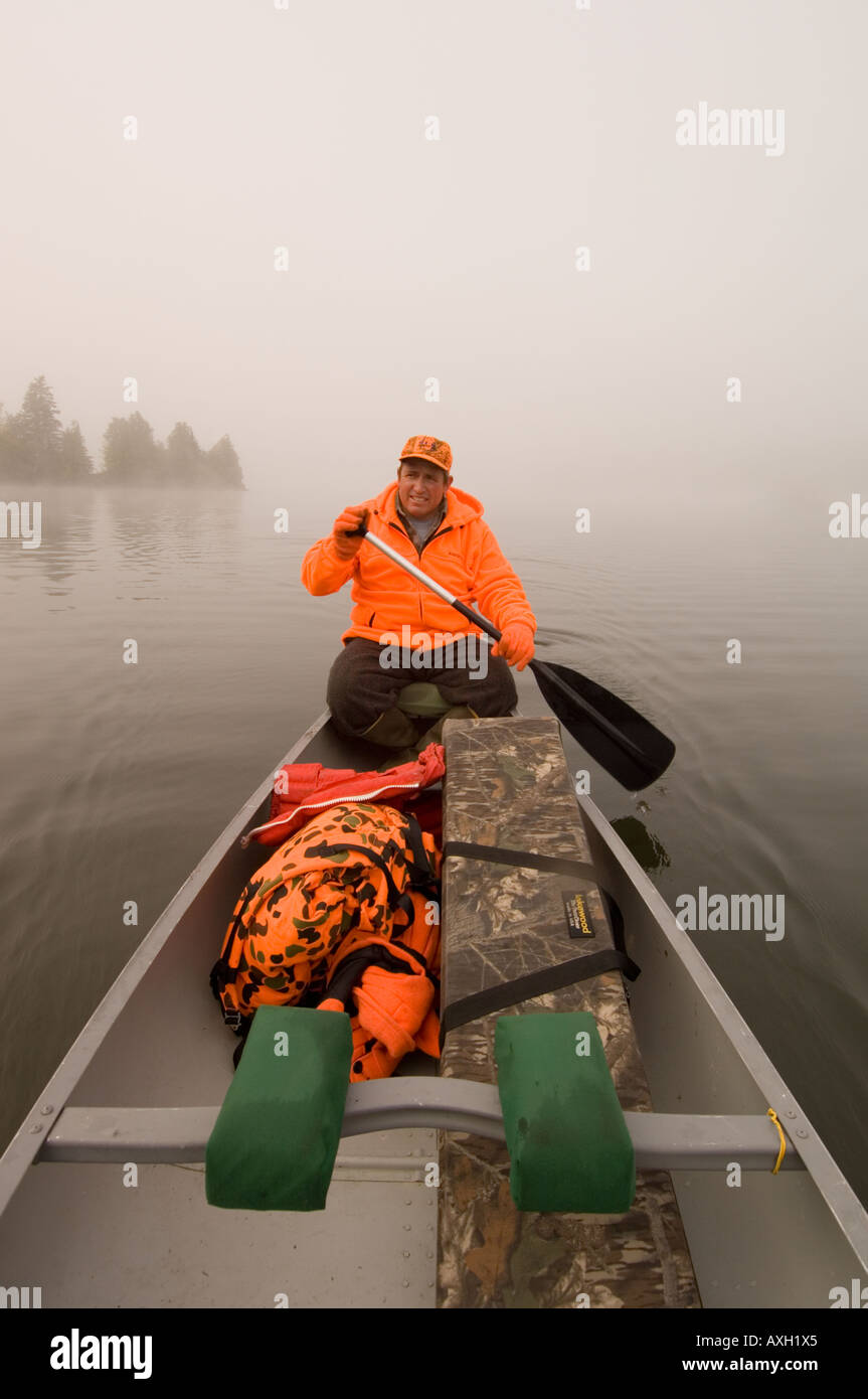 Hunter on canoe hi-res stock photography and images - Alamy