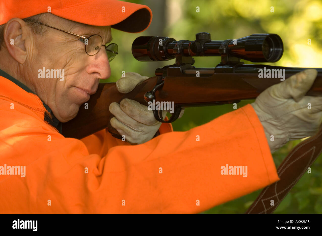 A DEER HUNTER TAKES AIM WITH 30 06 NORTH CENTRAL MINNESOTA Stock Photo ...
