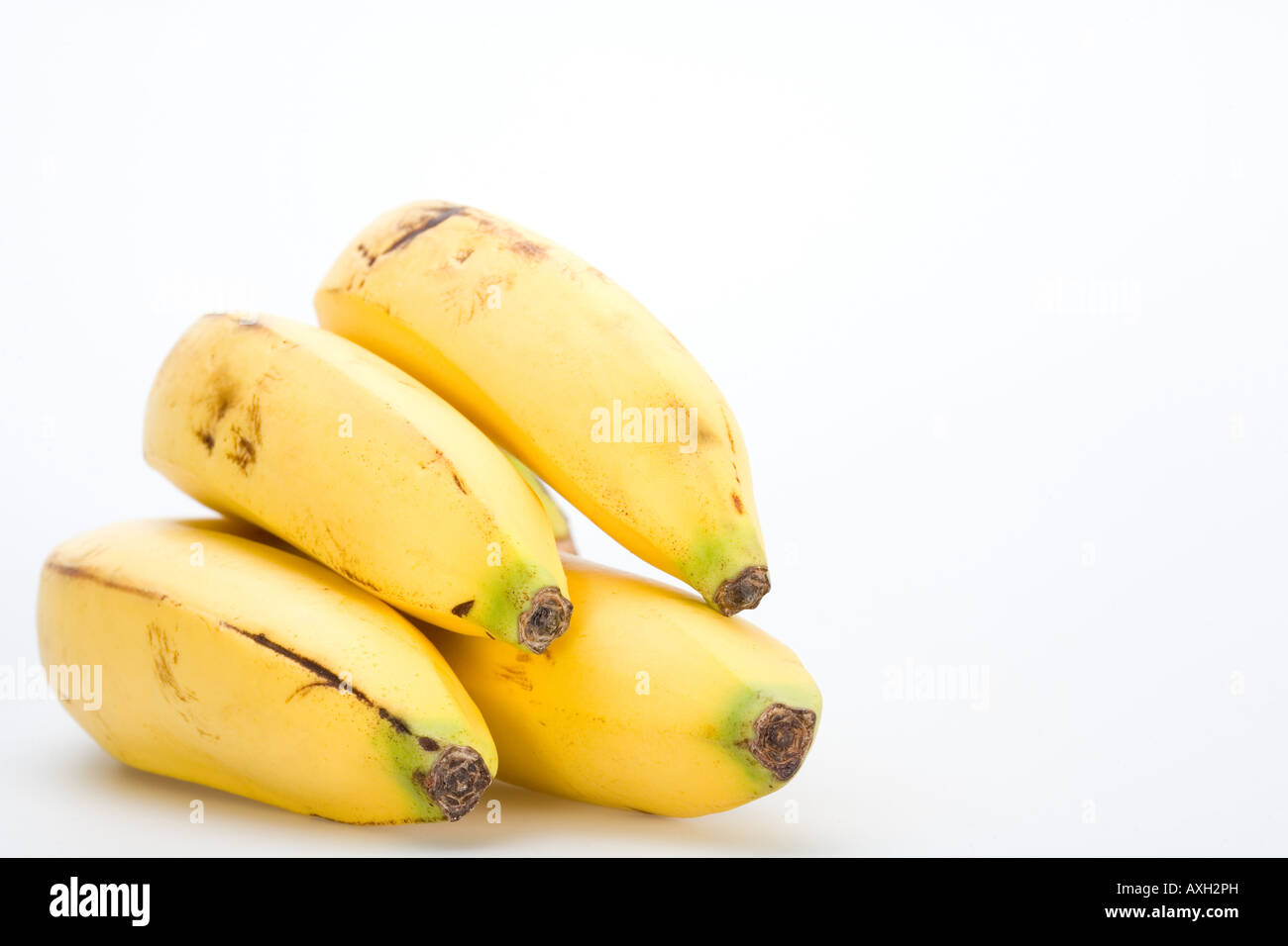 banana bundle isolated on white background Stock Photo - Alamy